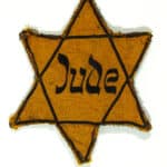 Jewish Badges During the Holocaust: The Othering of Jews Across Nazi Europe